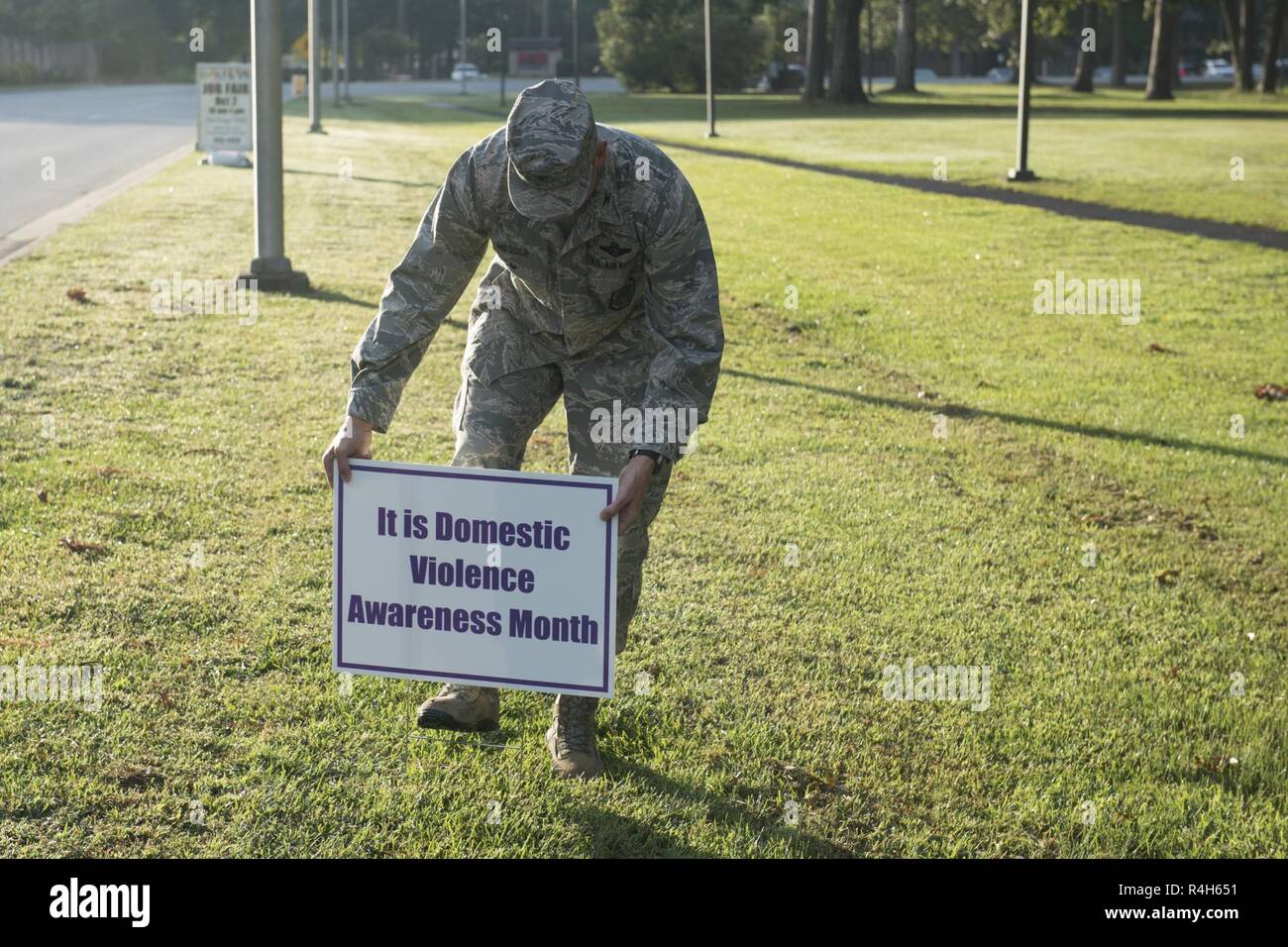 Col. Ryan Messer, 4th Fighter Wing vice commander, plants a sign next ...