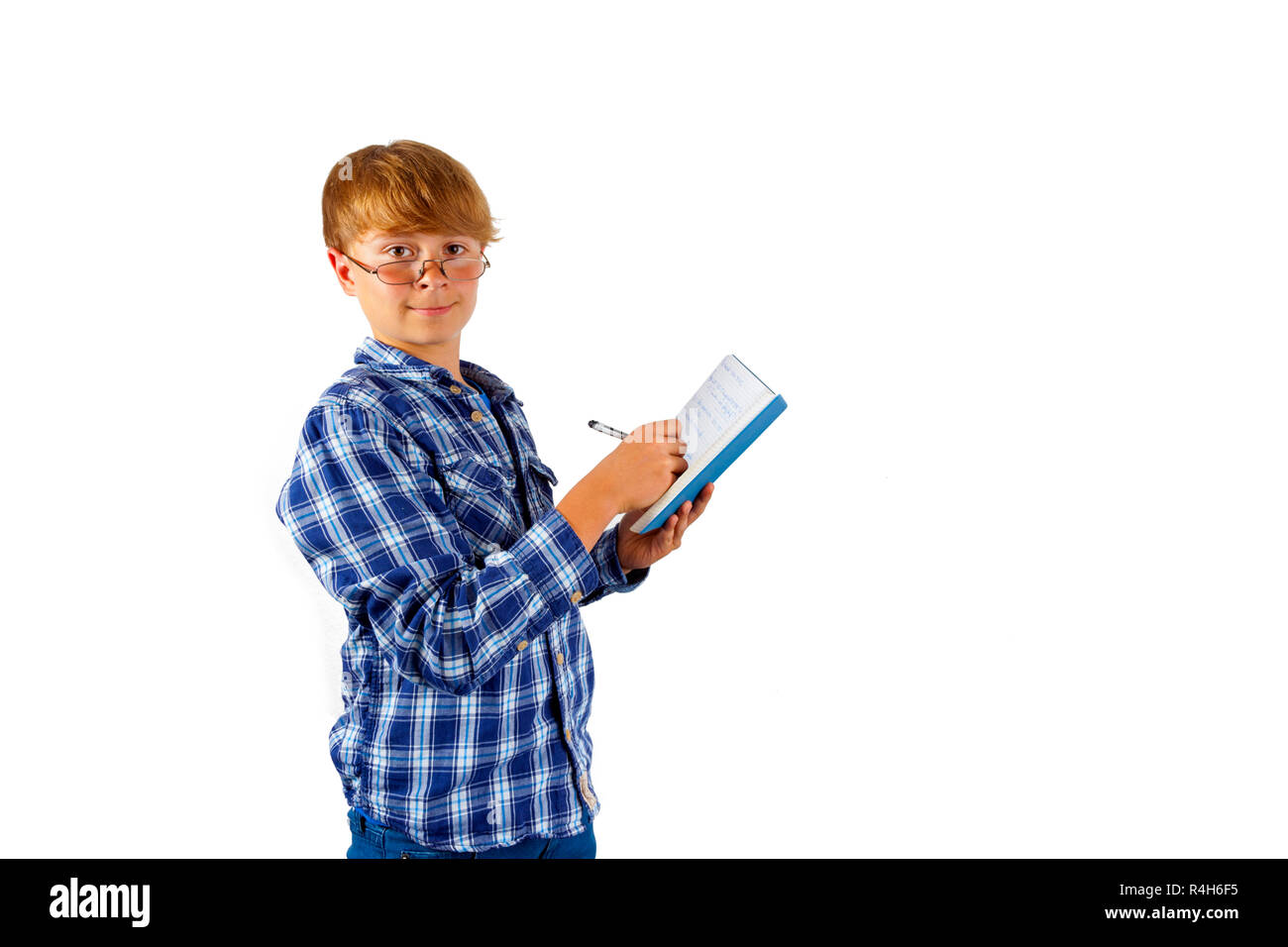 happy smart boy is reading in a book Stock Photo - Alamy