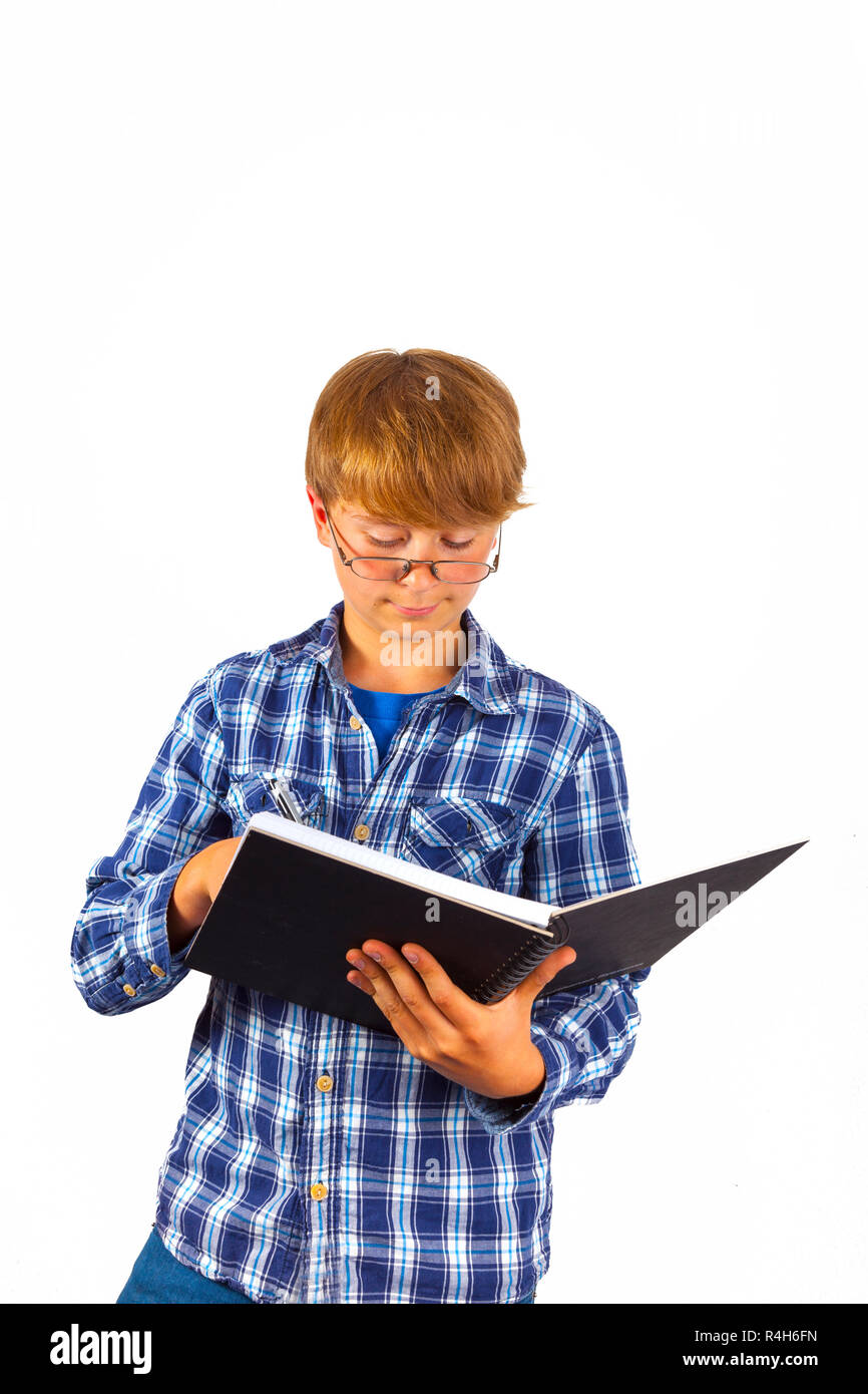 happy smart boy is reading in a book Stock Photo - Alamy