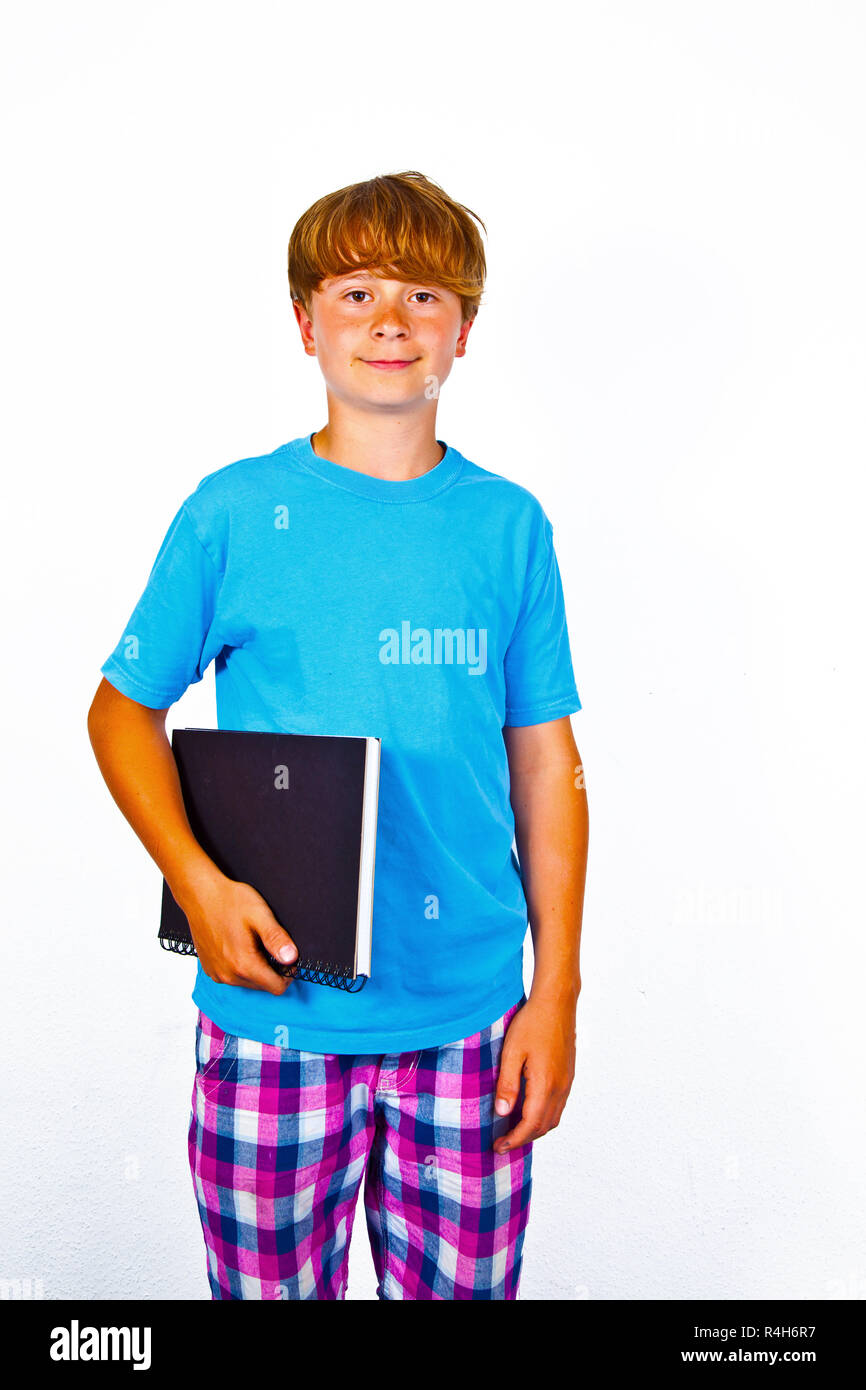 handsome teen with book, isolated on white, studio shot Stock Photo - Alamy
