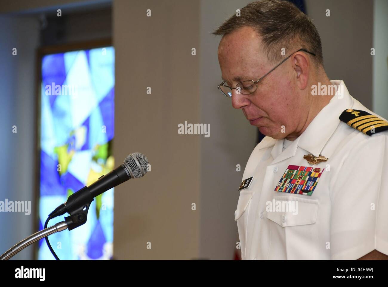 Capt. Dale White, Chaplain of Navy Medicine, delivers the benediction ...