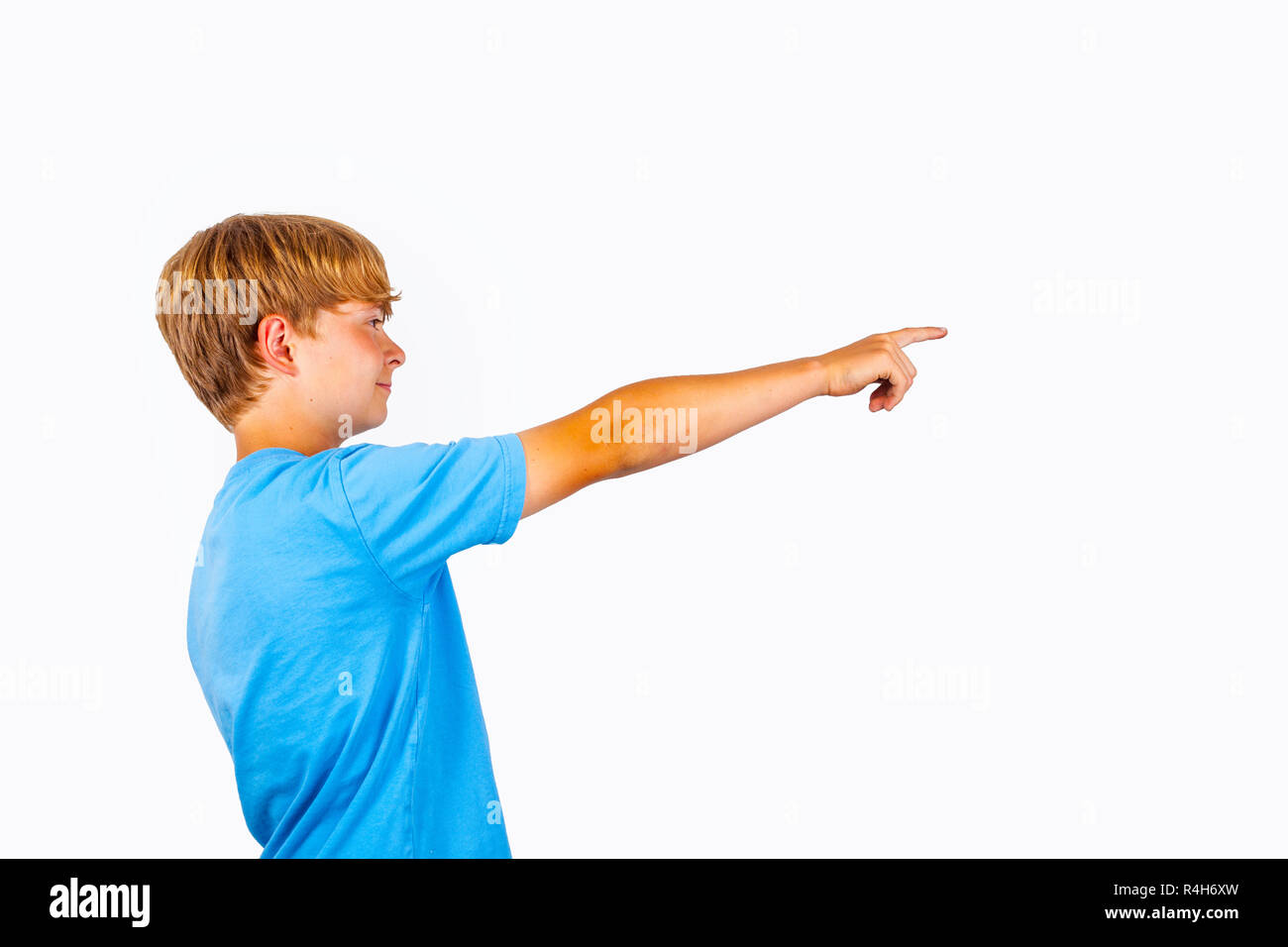boy showing with his arm in the foreward direction Stock Photo - Alamy