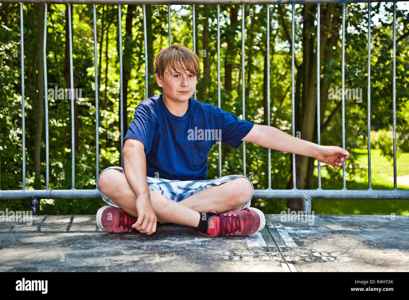 young happy boy sweating and exhausted from sports Stock Photo - Alamy