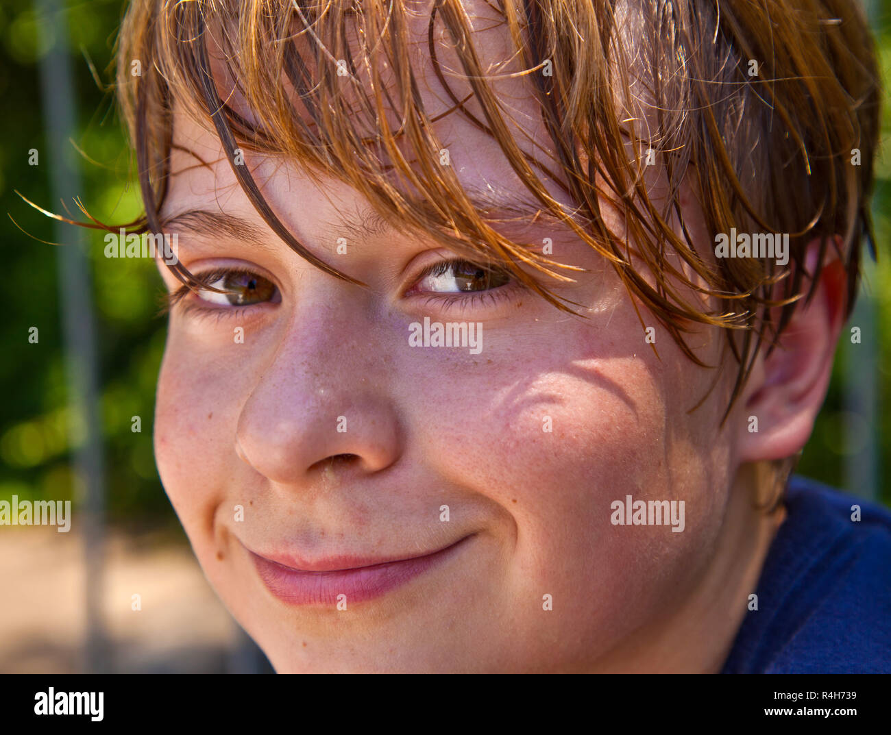 young happy boy sweating and exhausted from sports Stock Photo - Alamy