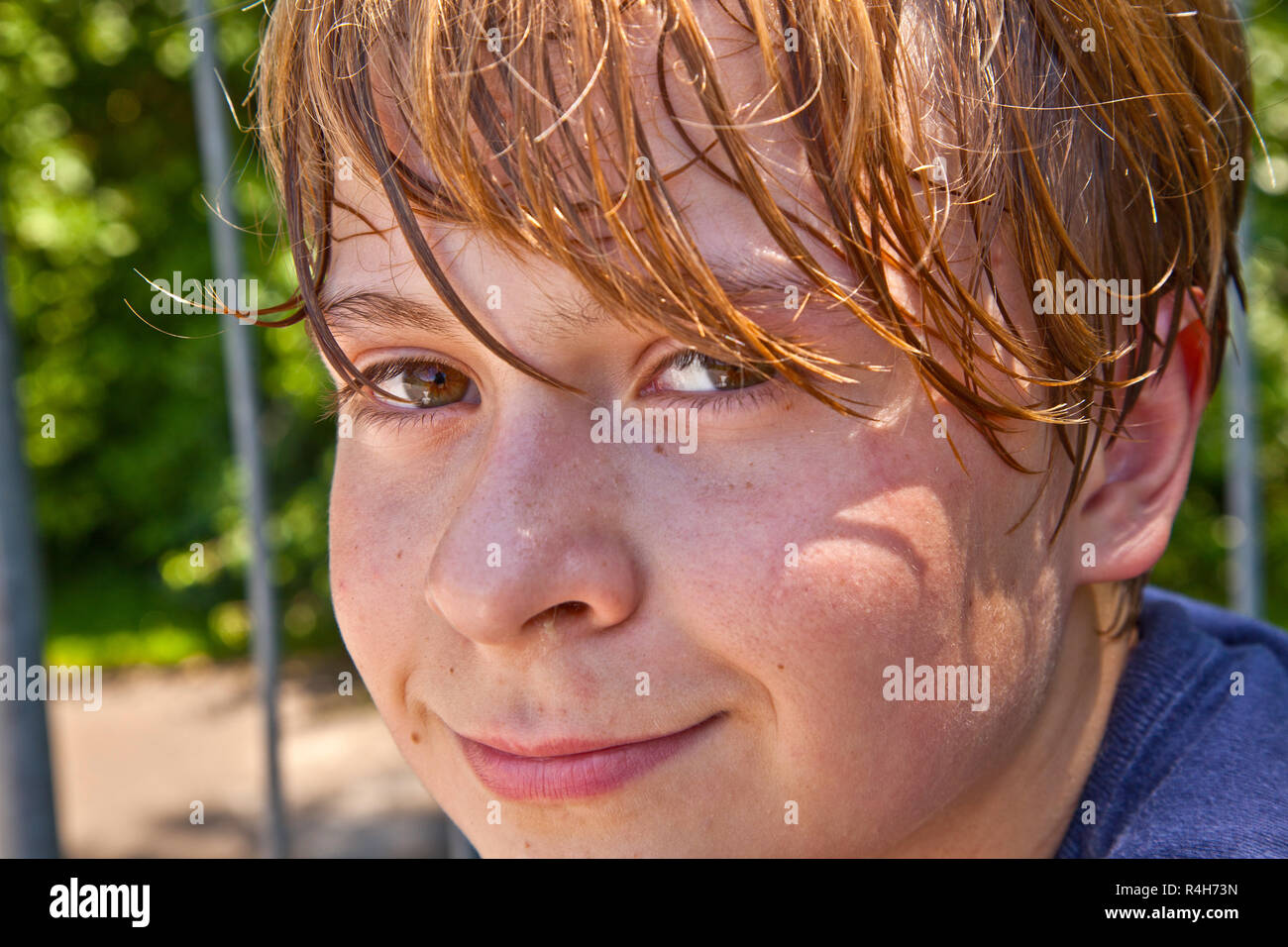 young happy boy sweating and exhausted from sports Stock Photo - Alamy