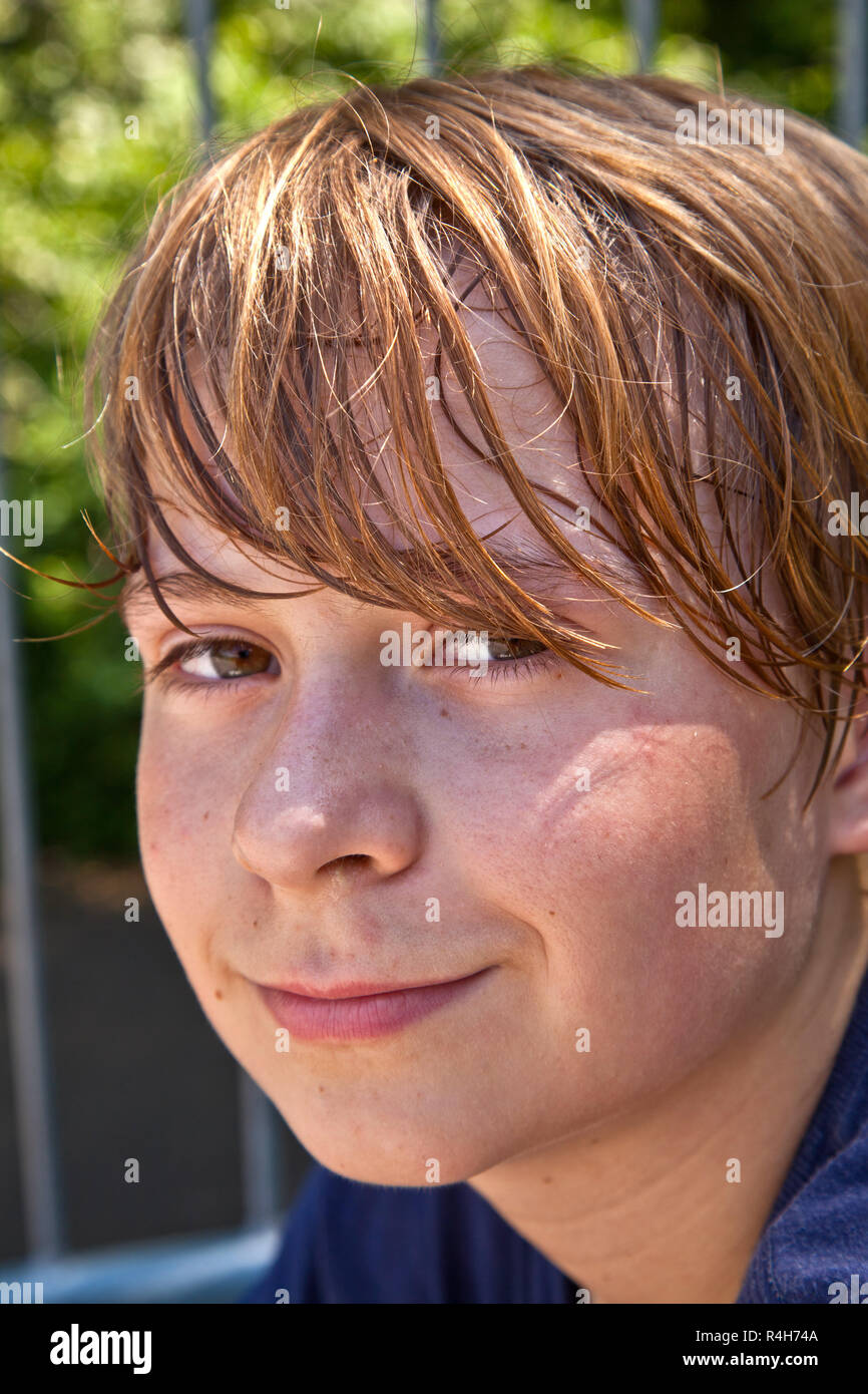 young happy boy sweating and exhausted from sports Stock Photo - Alamy