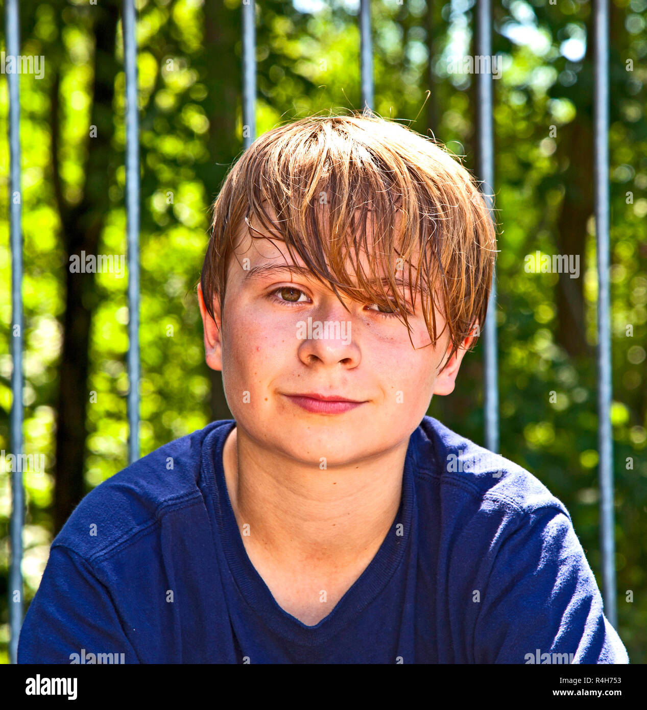 young happy boy sweating and exhausted from sports Stock Photo - Alamy