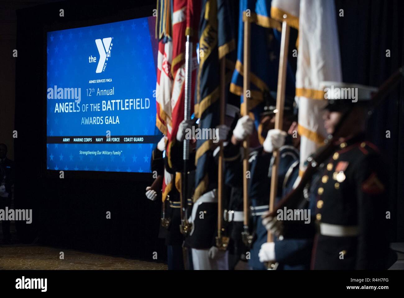 A Joint Service Honor Guard presents the colors to begin the 2018 Armed ...