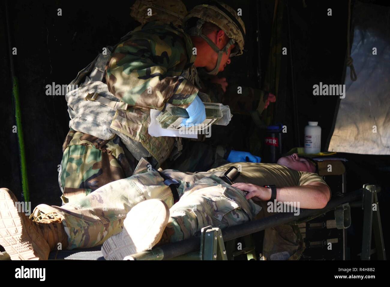 A medic with Headquarters and Headquarters Company, 3rd Brigade ...