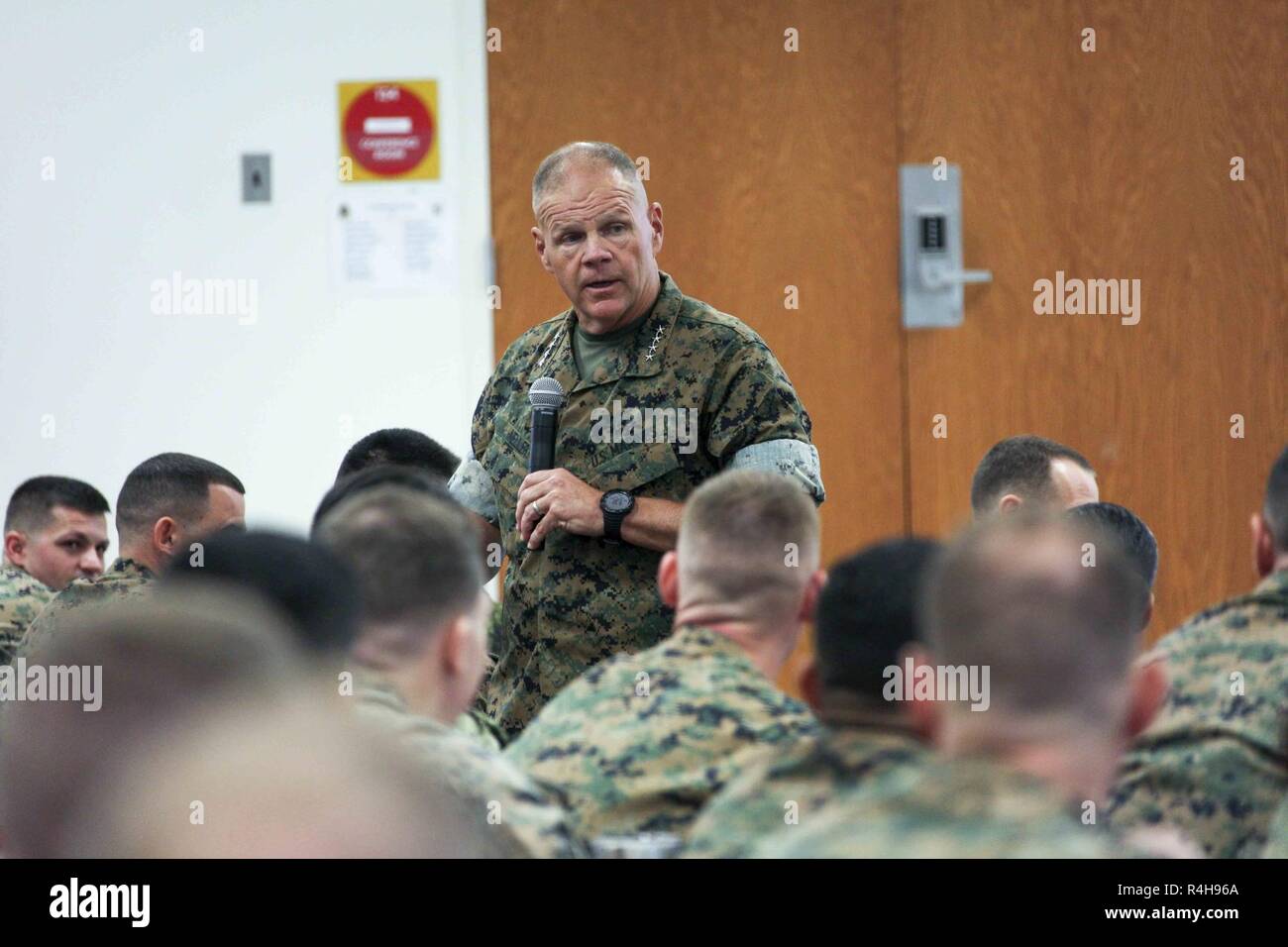Commandant of the Marine Corps Gen. Robert B. Neller speaks to an ...