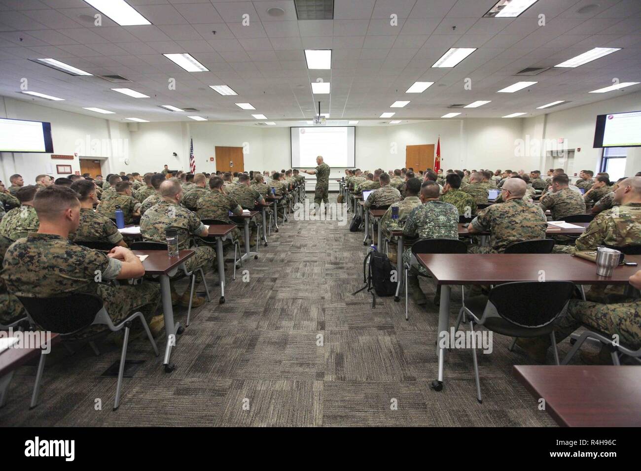 Commandant of the Marine Corps Gen. Robert B. Neller speaks to an ...