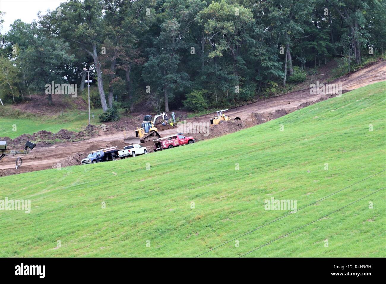 Contractors complete groundwork as part of construction and ...