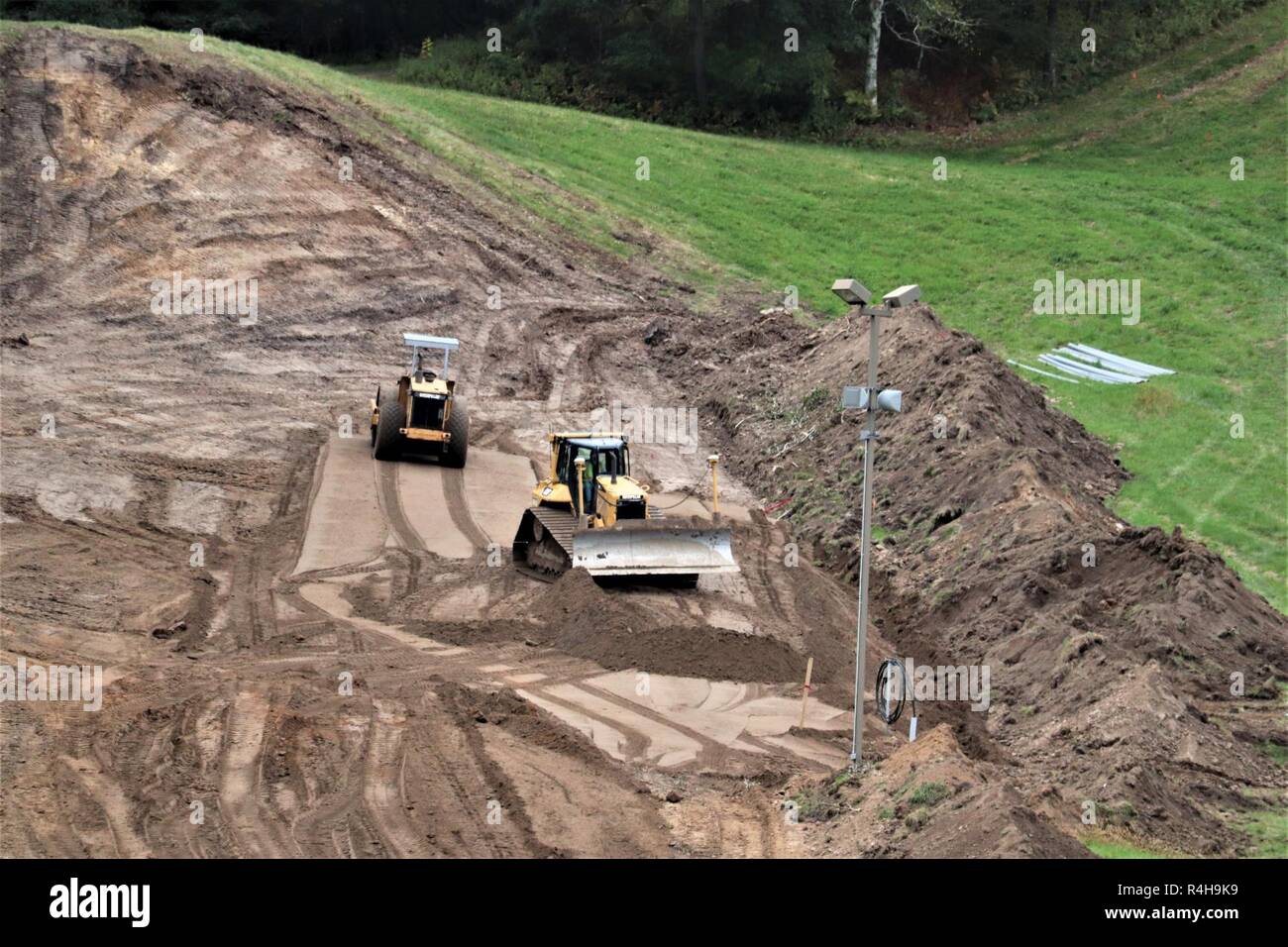 Contractors complete groundwork as part of construction and ...