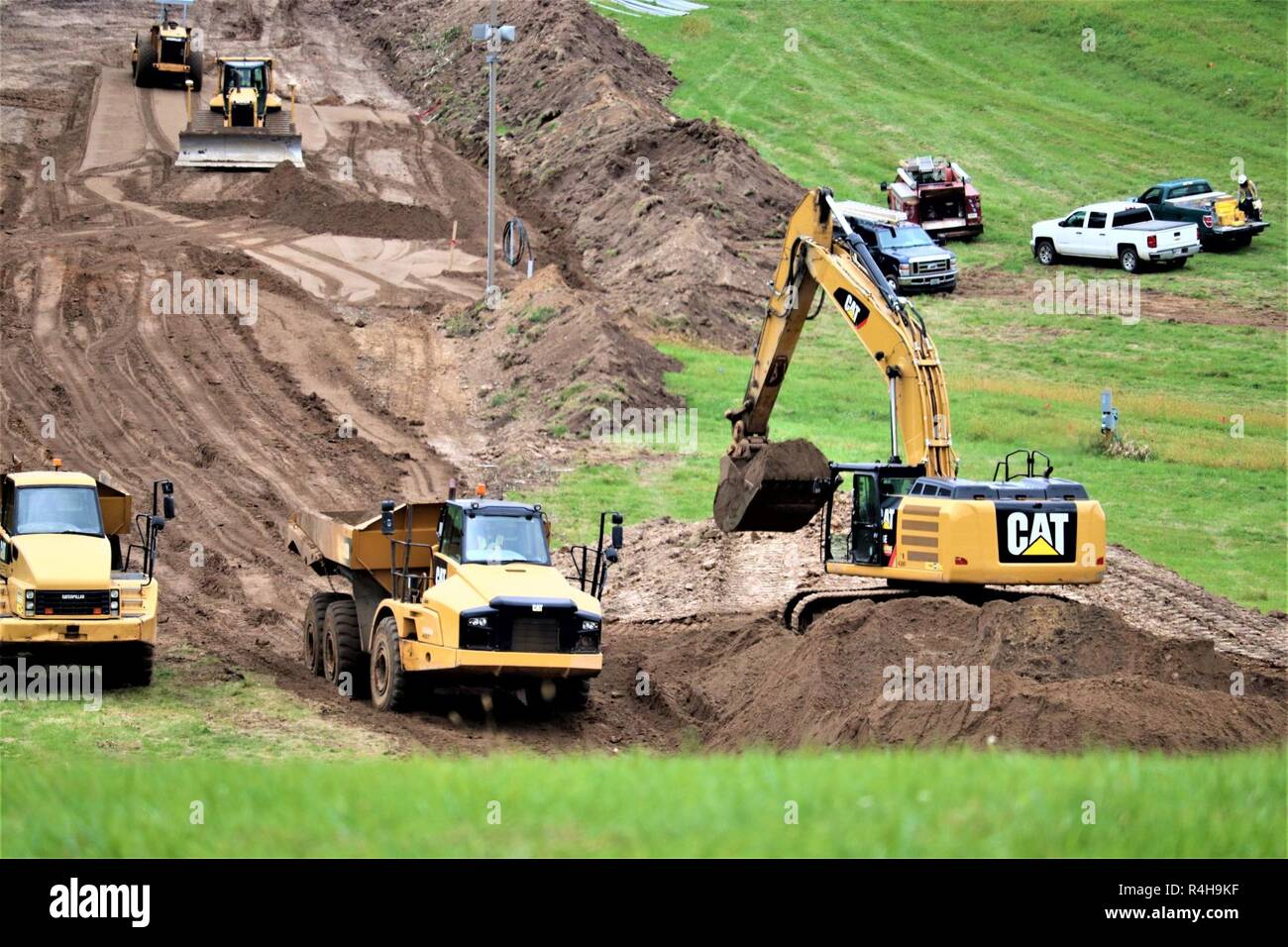 Contractors complete groundwork as part of construction and ...