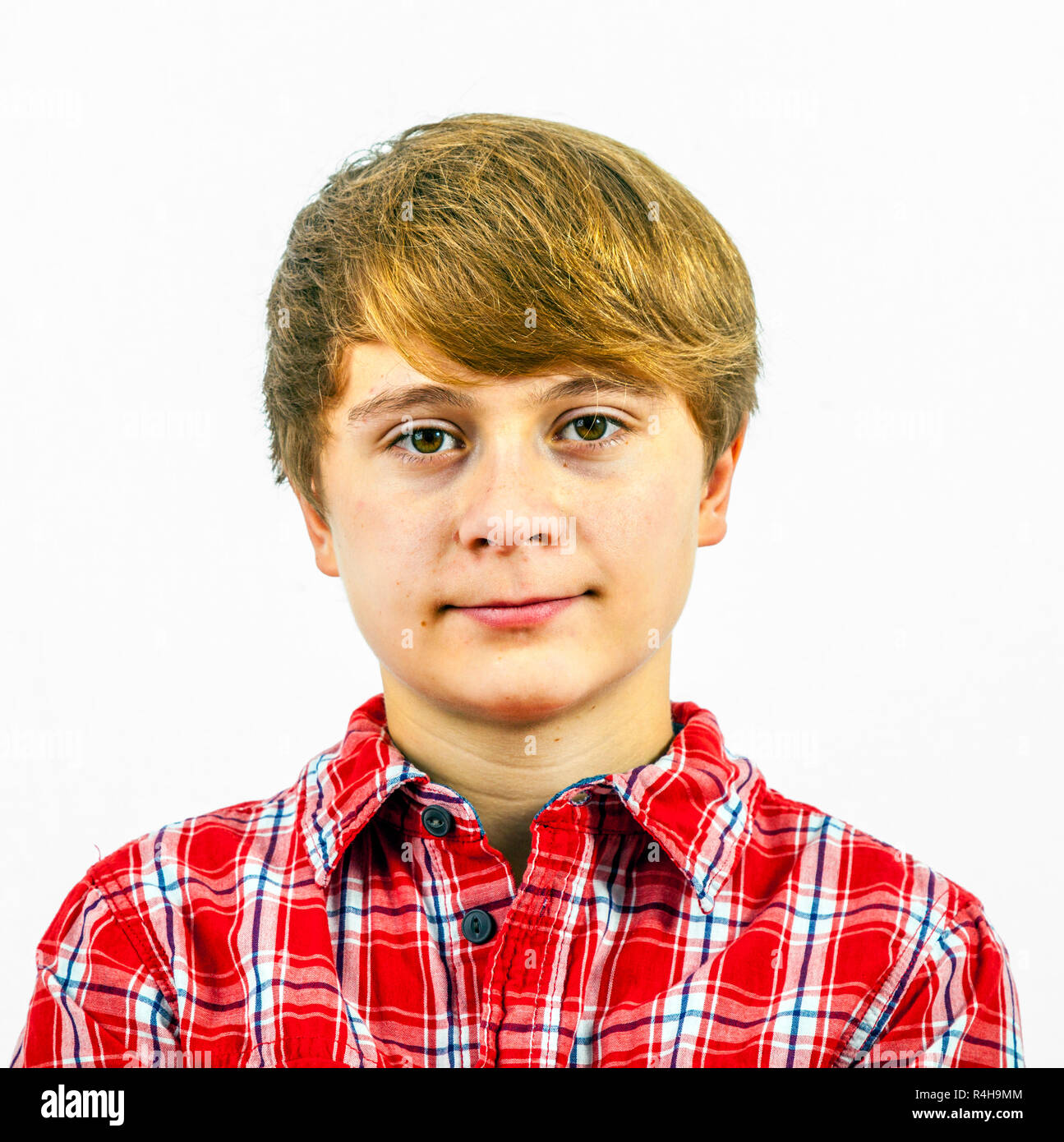 friendly looking young boy Stock Photo - Alamy