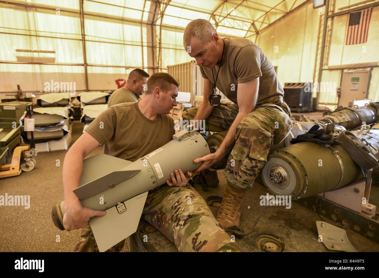 U.S. Air Force Staff Sgt. Patrick Waters, left, and Tech. Sgt. Sherman ...