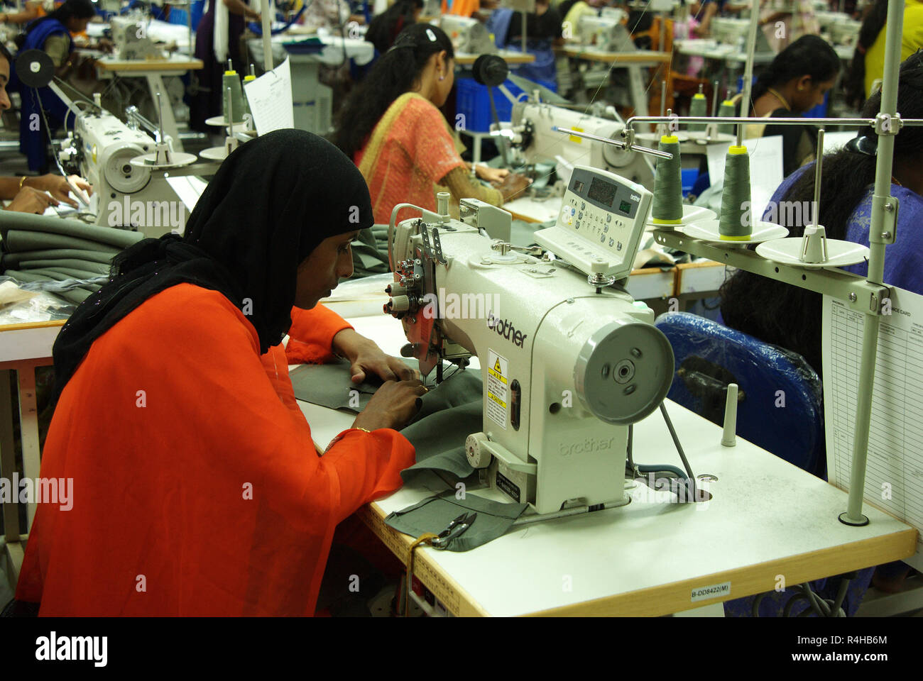 Women stitching clothes hi-res stock photography and images - Alamy