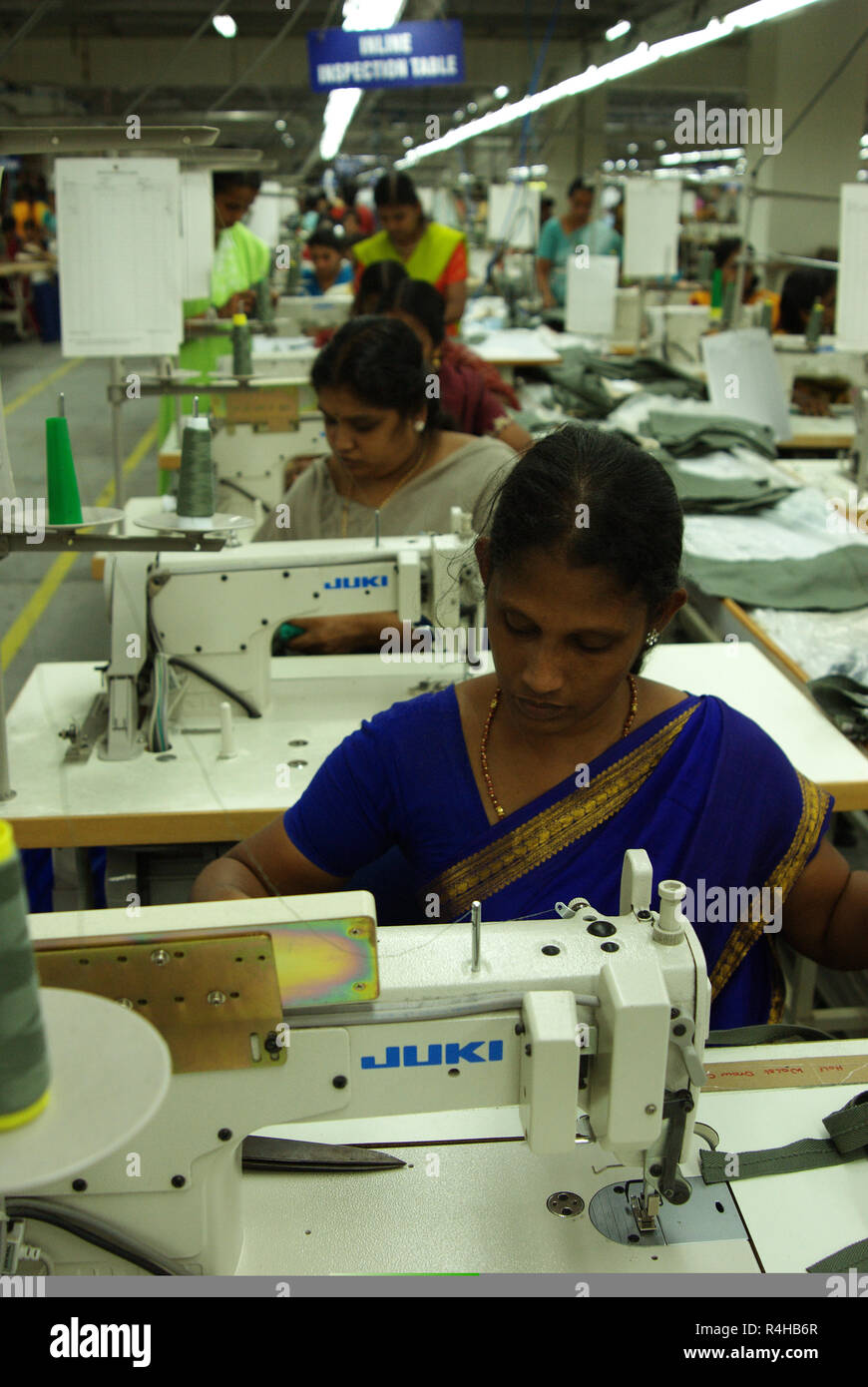 Women stitching clothes hi-res stock photography and images - Alamy