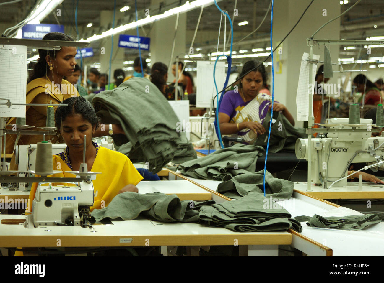 Women stitching clothes hi-res stock photography and images - Alamy