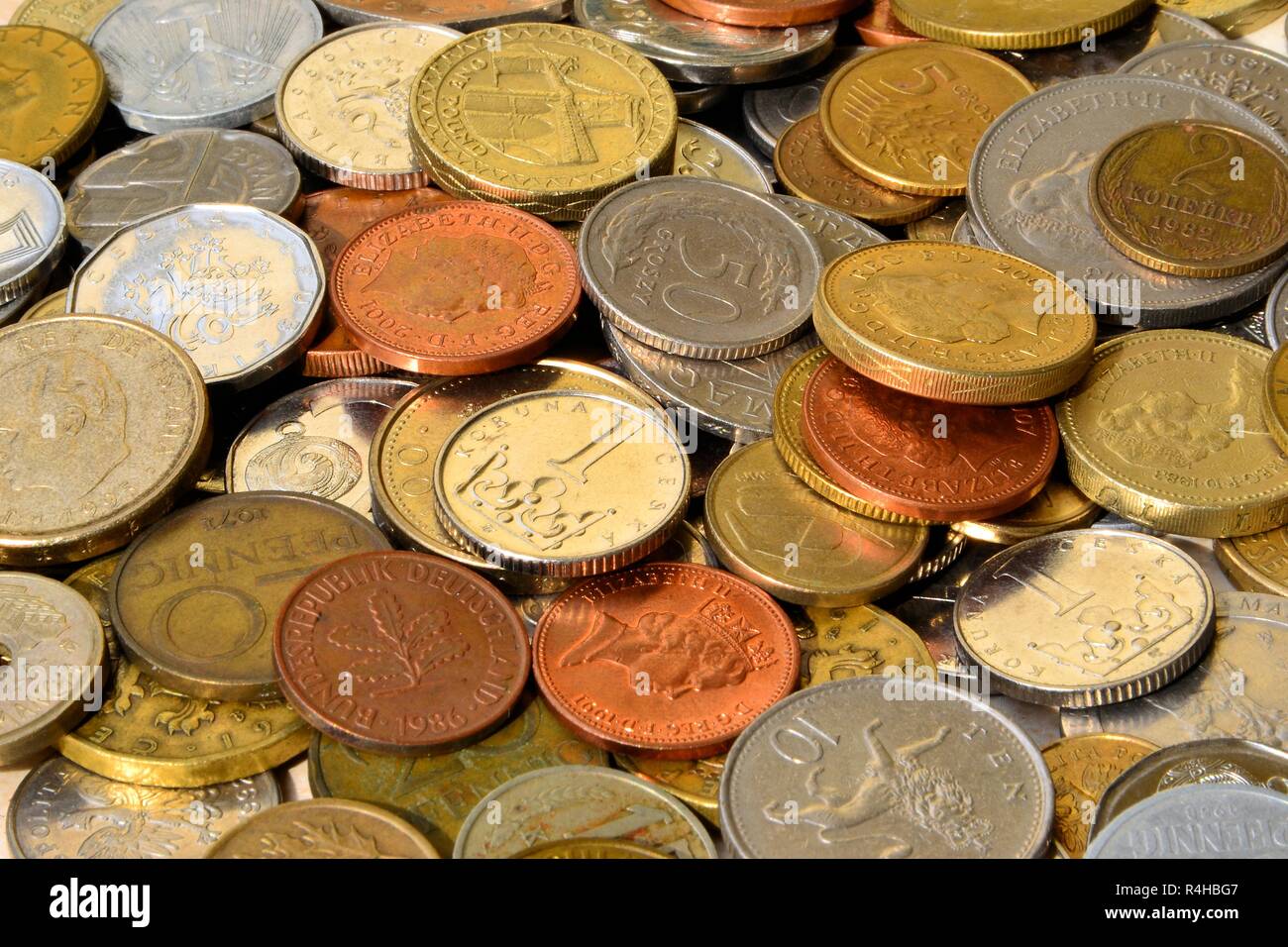 Coins from all over the world Stock Photo - Alamy