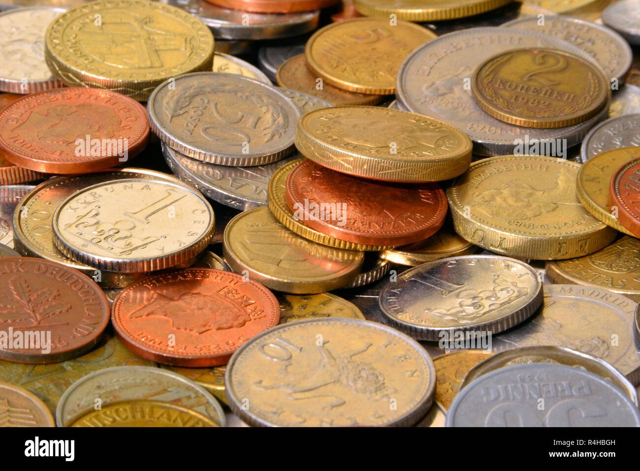 Coins from all over the world Stock Photo - Alamy