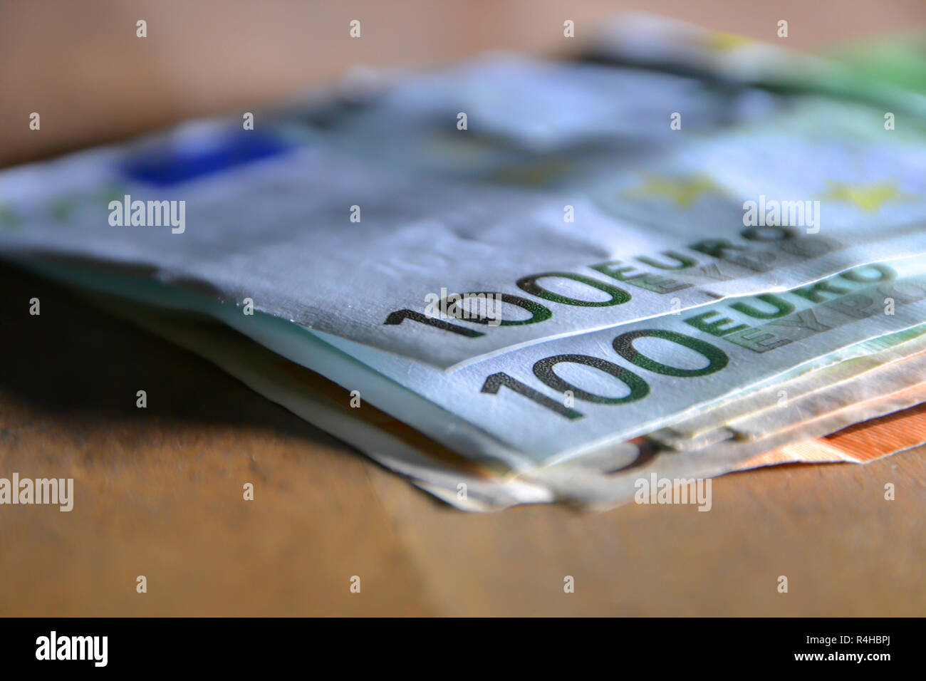 Euro notes on a table Stock Photo - Alamy