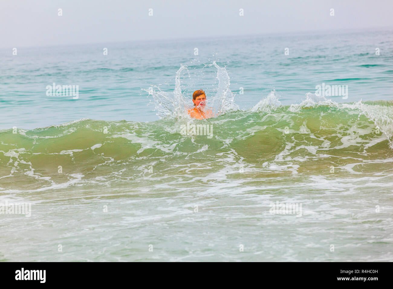 handsome boy at the beach Stock Photo - Alamy