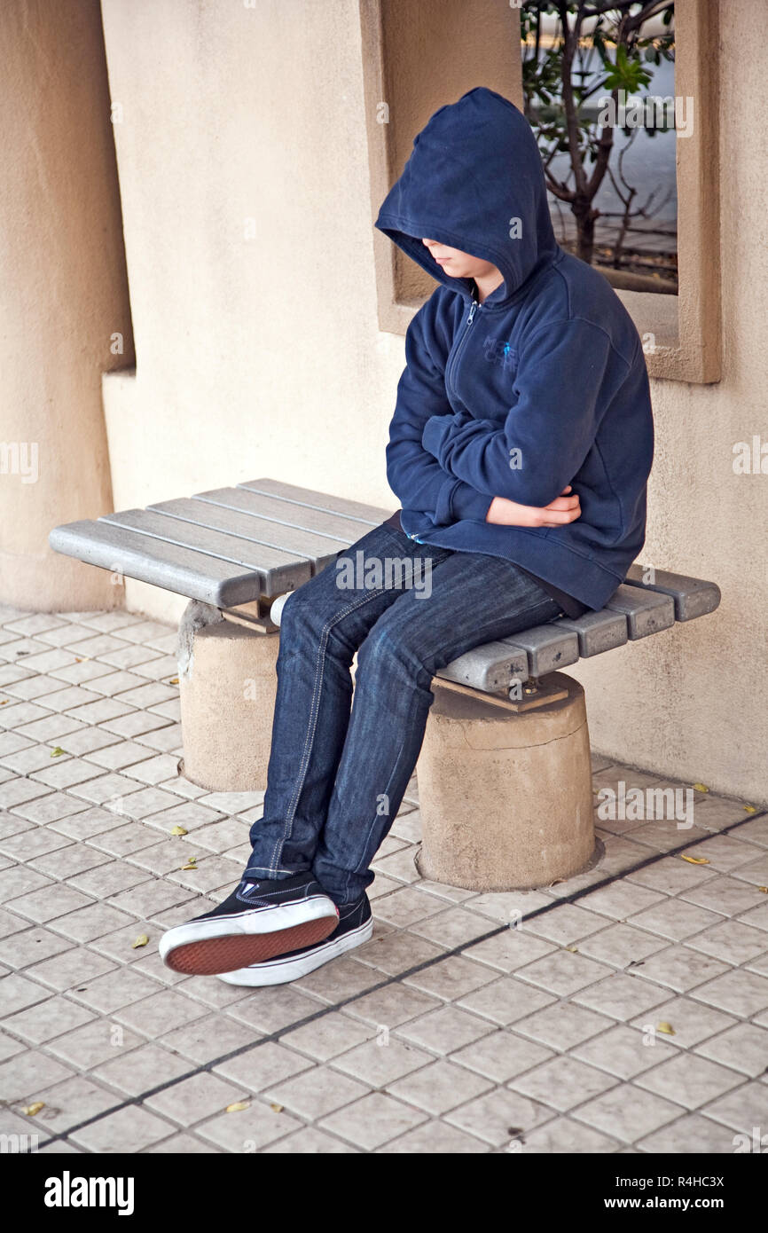 boy is freezing in the cold ugly weather Stock Photo - Alamy