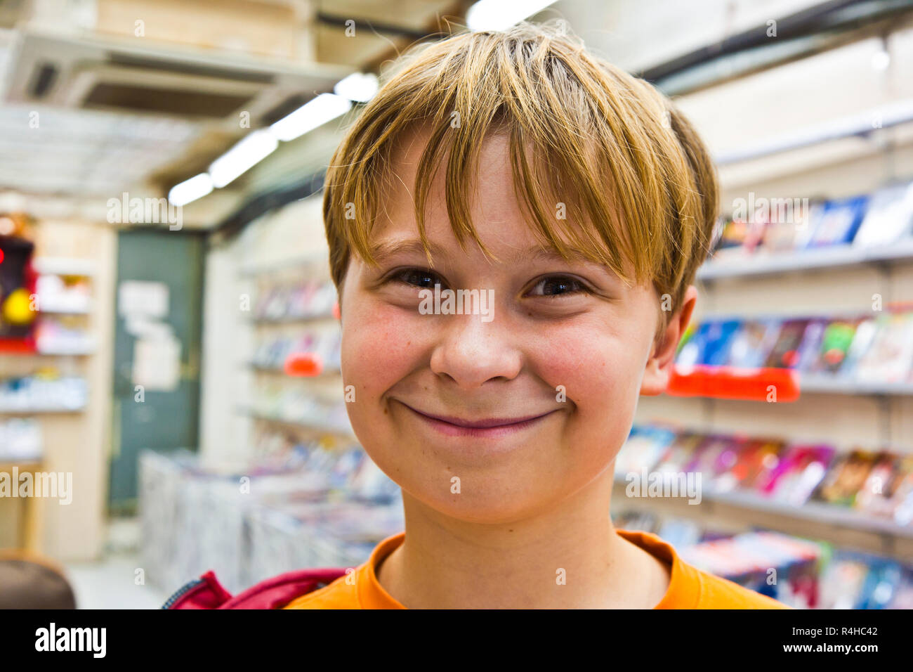happy boy smiles all over the face and looks self confident Stock Photo ...