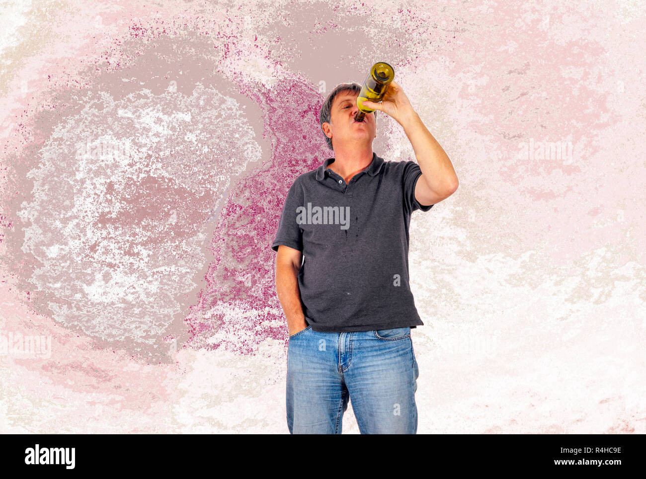 man drinks alcohol out of a bottle Stock Photo - Alamy