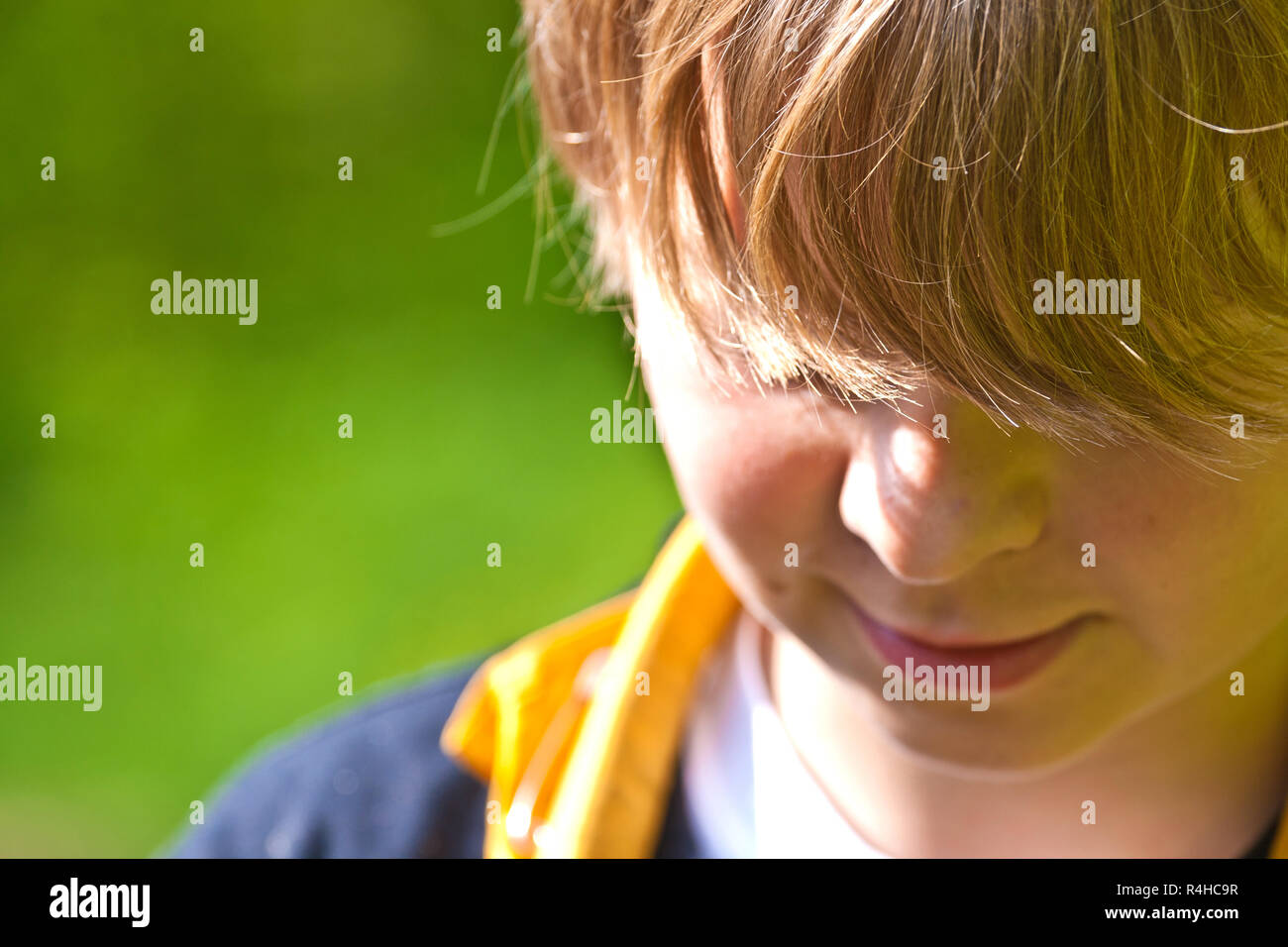portrait of cute smiling boy in nature Stock Photo - Alamy