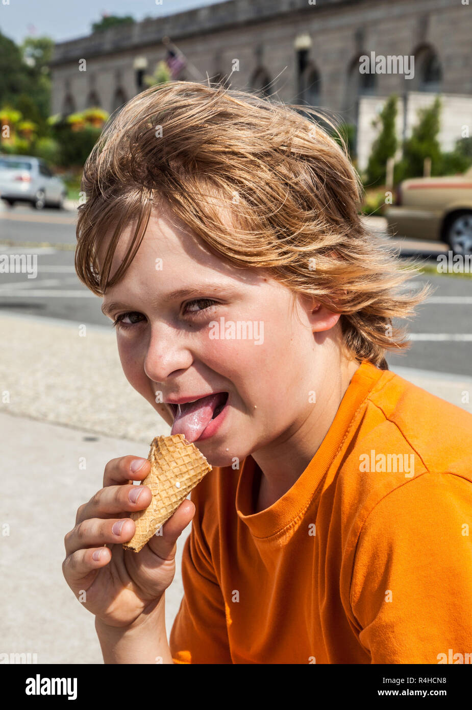 young boy eating a tasty ice cream Stock Photo - Alamy