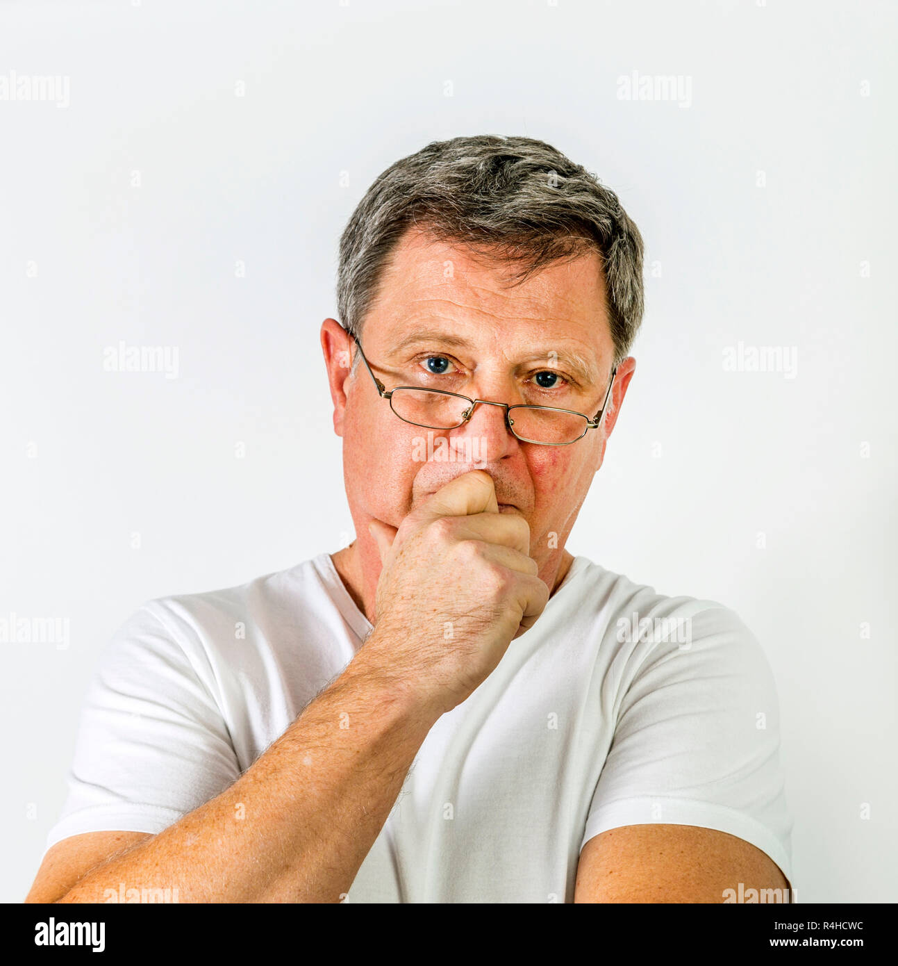 man in thinking gesture Stock Photo - Alamy