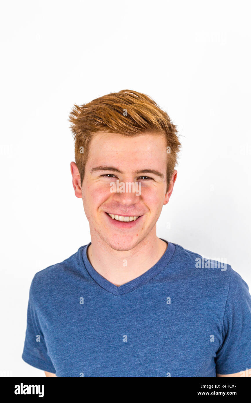 cool boy with red hair posing in studio Stock Photo - Alamy