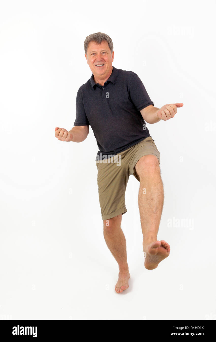 Full Length Portrait of Confident Barefoot Man in Blue Jeans Stock ...