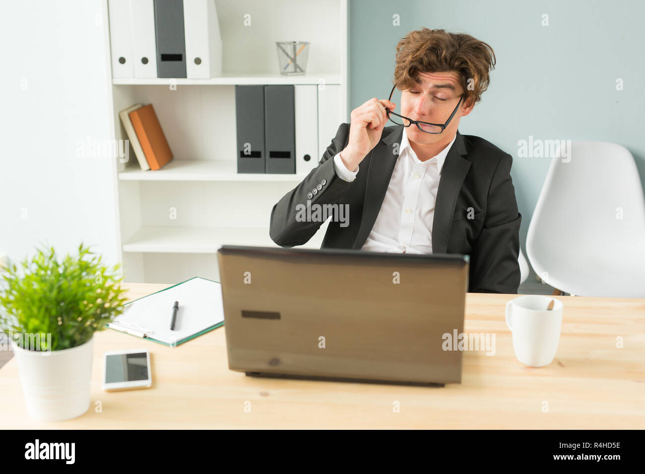 Humor, joke and business people concept - funny man tired after working ...