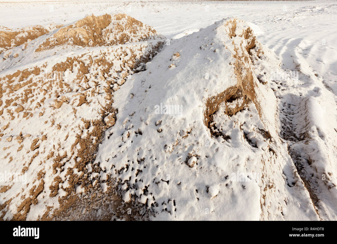 Yellow sand under snow hi-res stock photography and images - Alamy