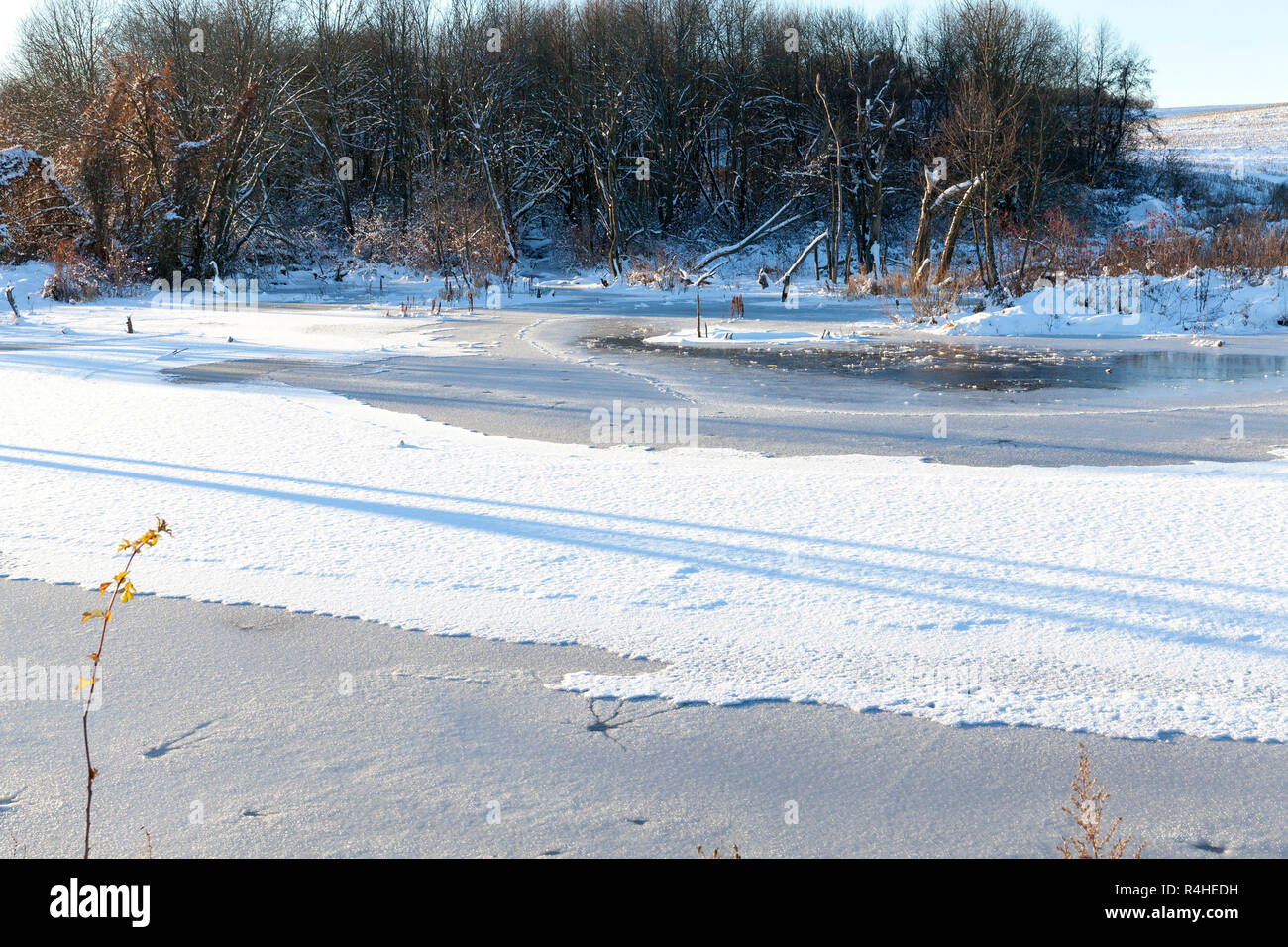 Lake covered with snow Stock Photo - Alamy