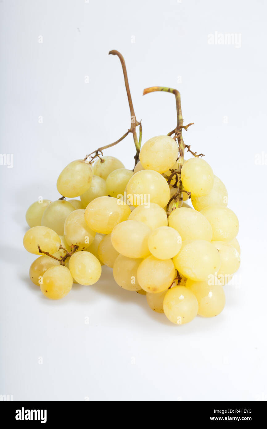 Sweet and ripe white grapes isolated on white Stock Photo - Alamy