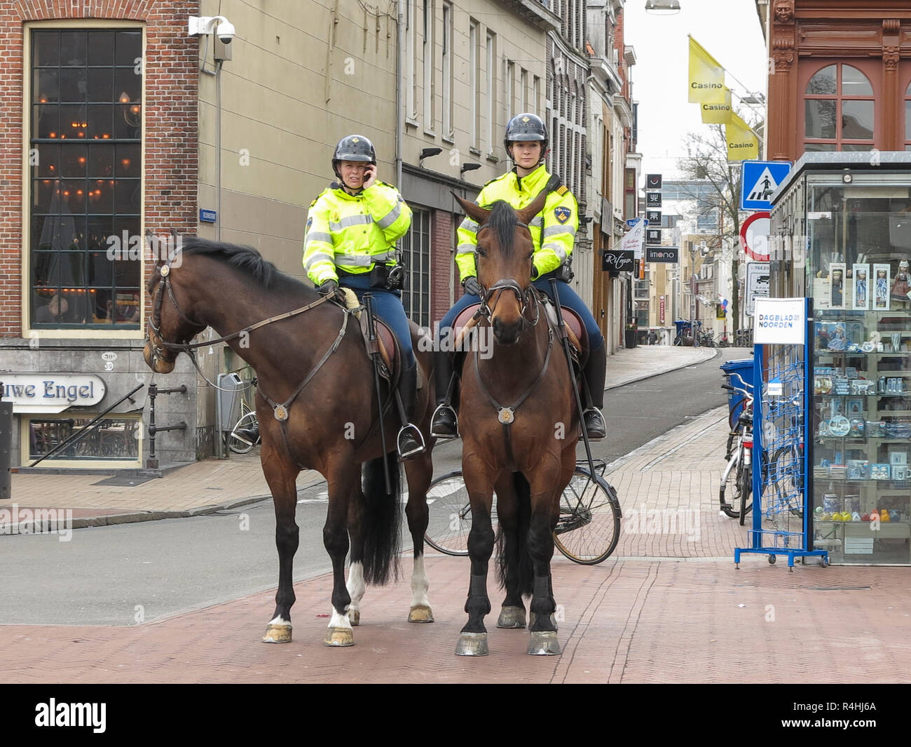 Two female mounted police officers in the centre of Groningen city, The ...