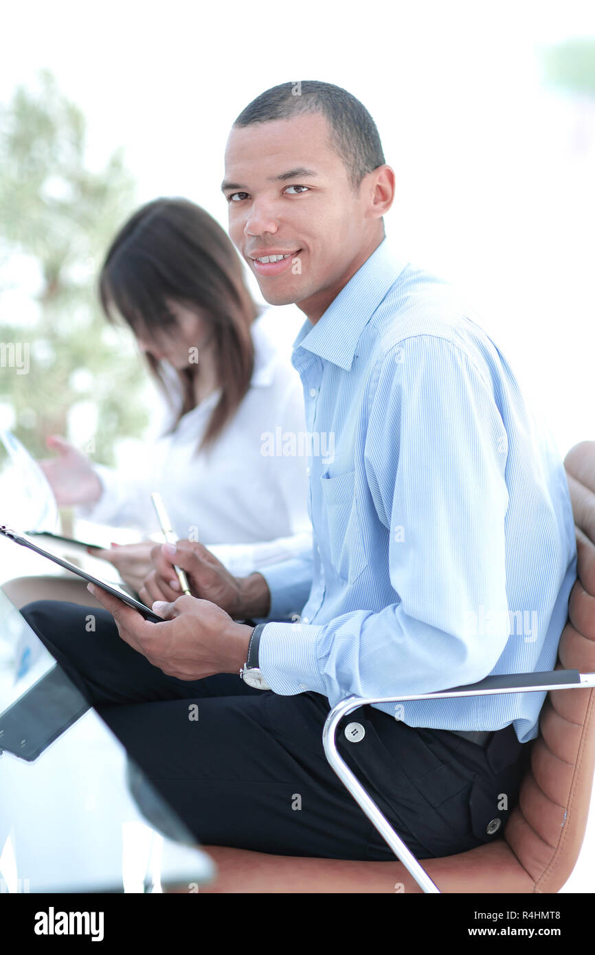 successful young business men with financial document Stock Photo - Alamy