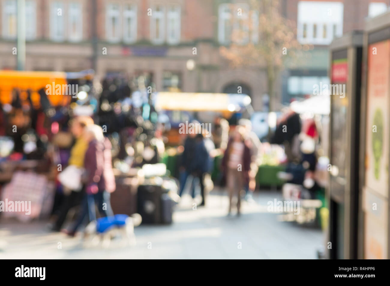 Busy market place with people on street in background Stock Photo - Alamy