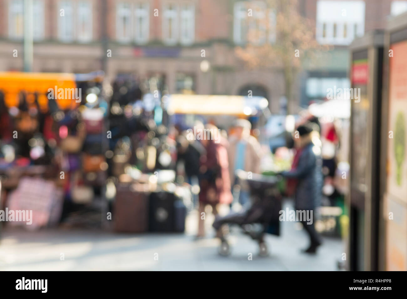 Busy market place with people on street in background Stock Photo - Alamy