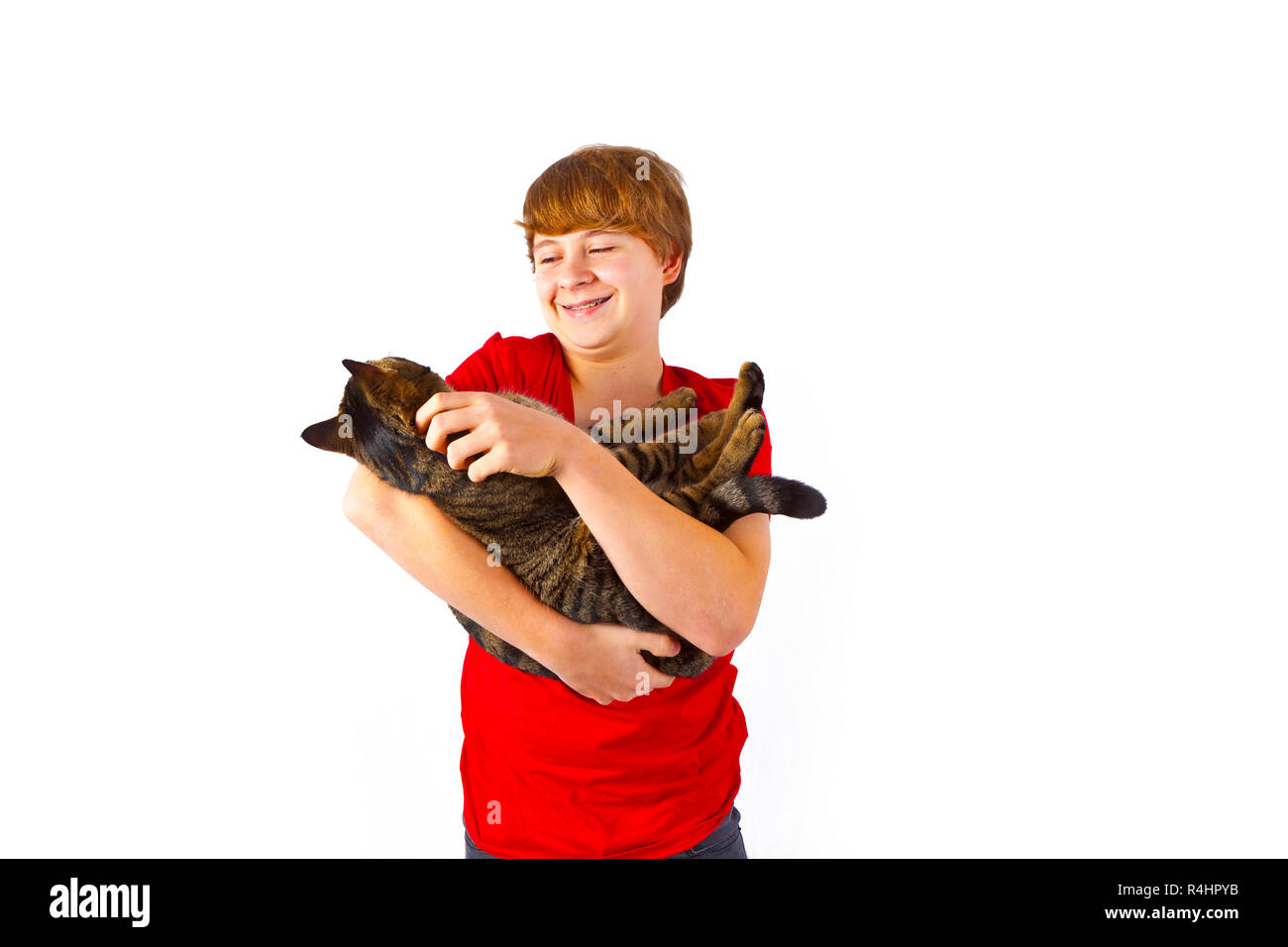 cute boy hugging with his cat Stock Photo - Alamy