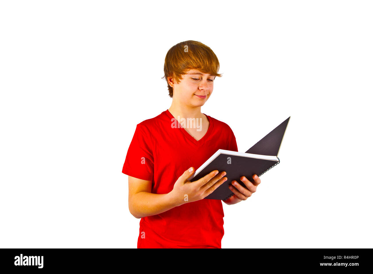 smart boy reading in a book Stock Photo - Alamy