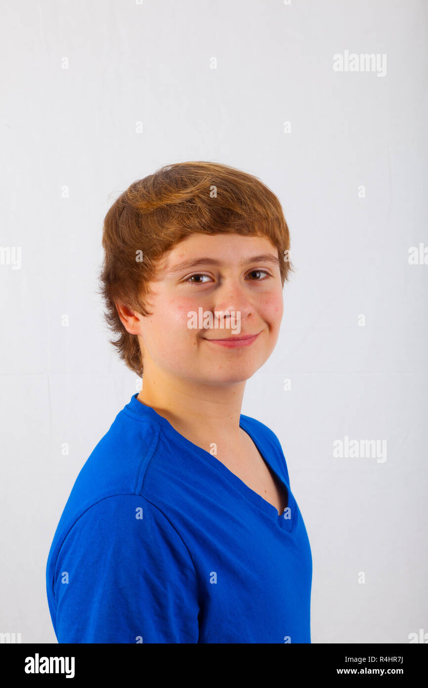 smart happy young boy posing in studio Stock Photo - Alamy
