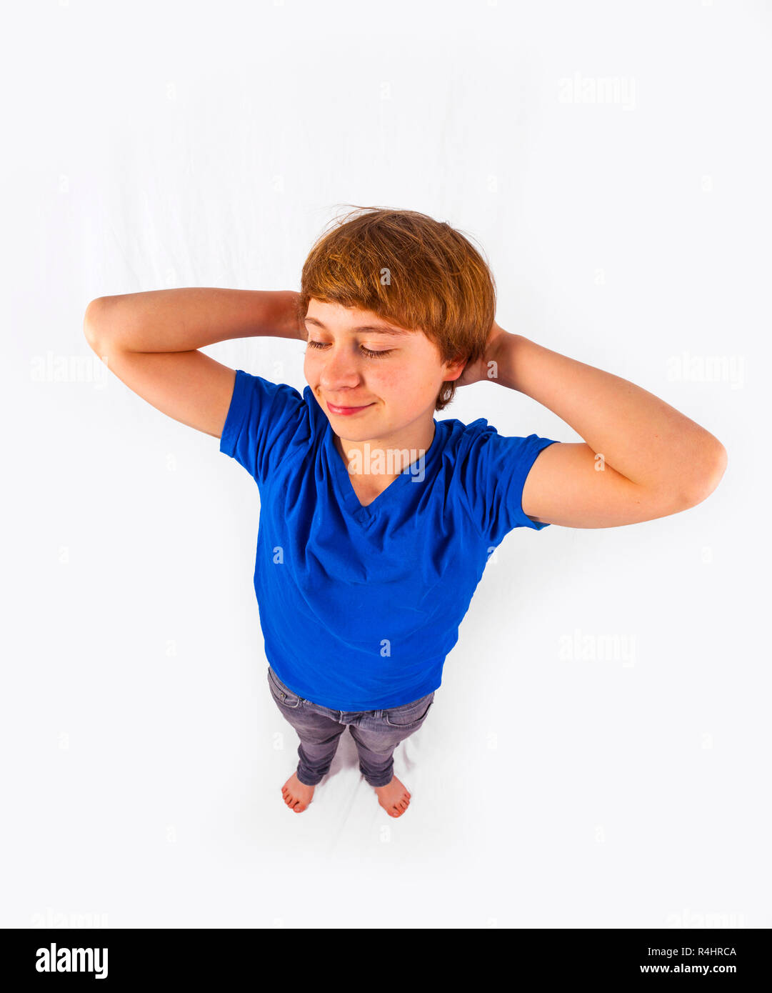 funny perspective of standing handsome boy Stock Photo - Alamy