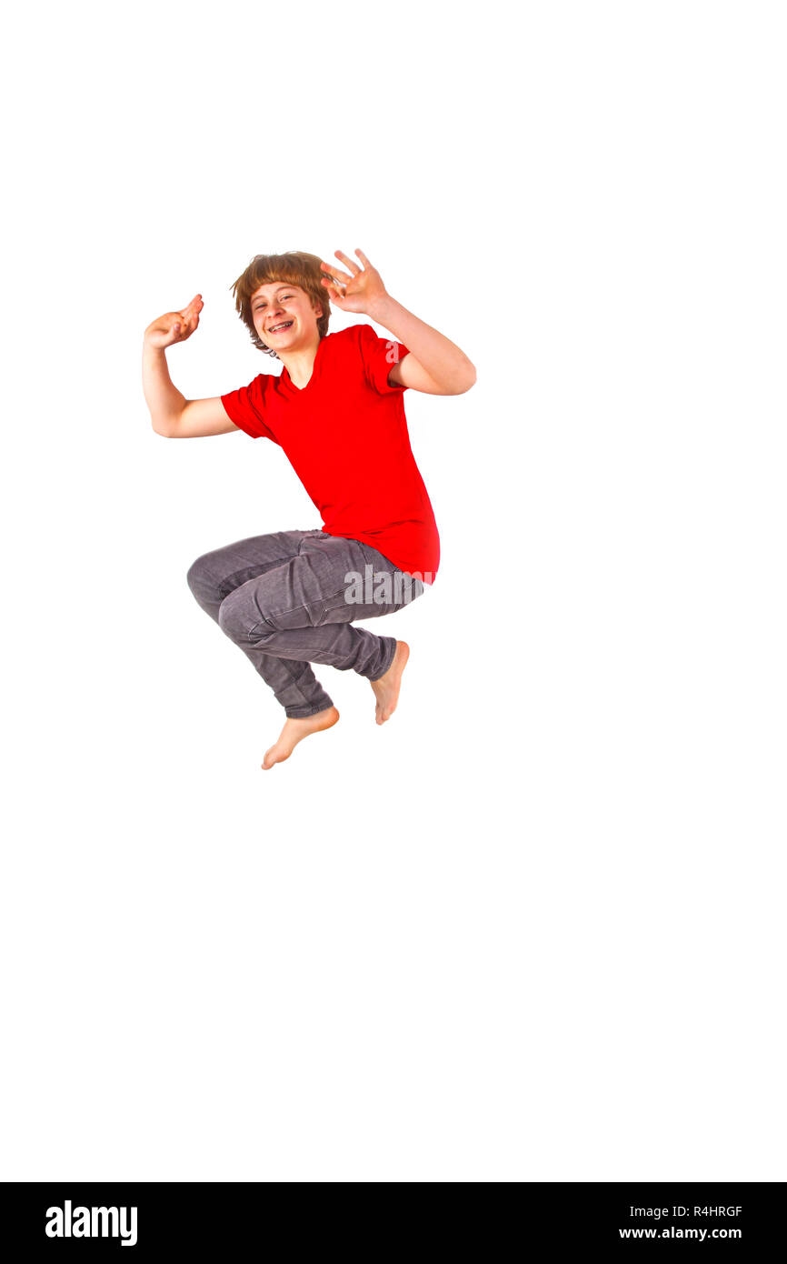Portrait Of Teenage Boy Jumping In The Air Stock Photo - Alamy