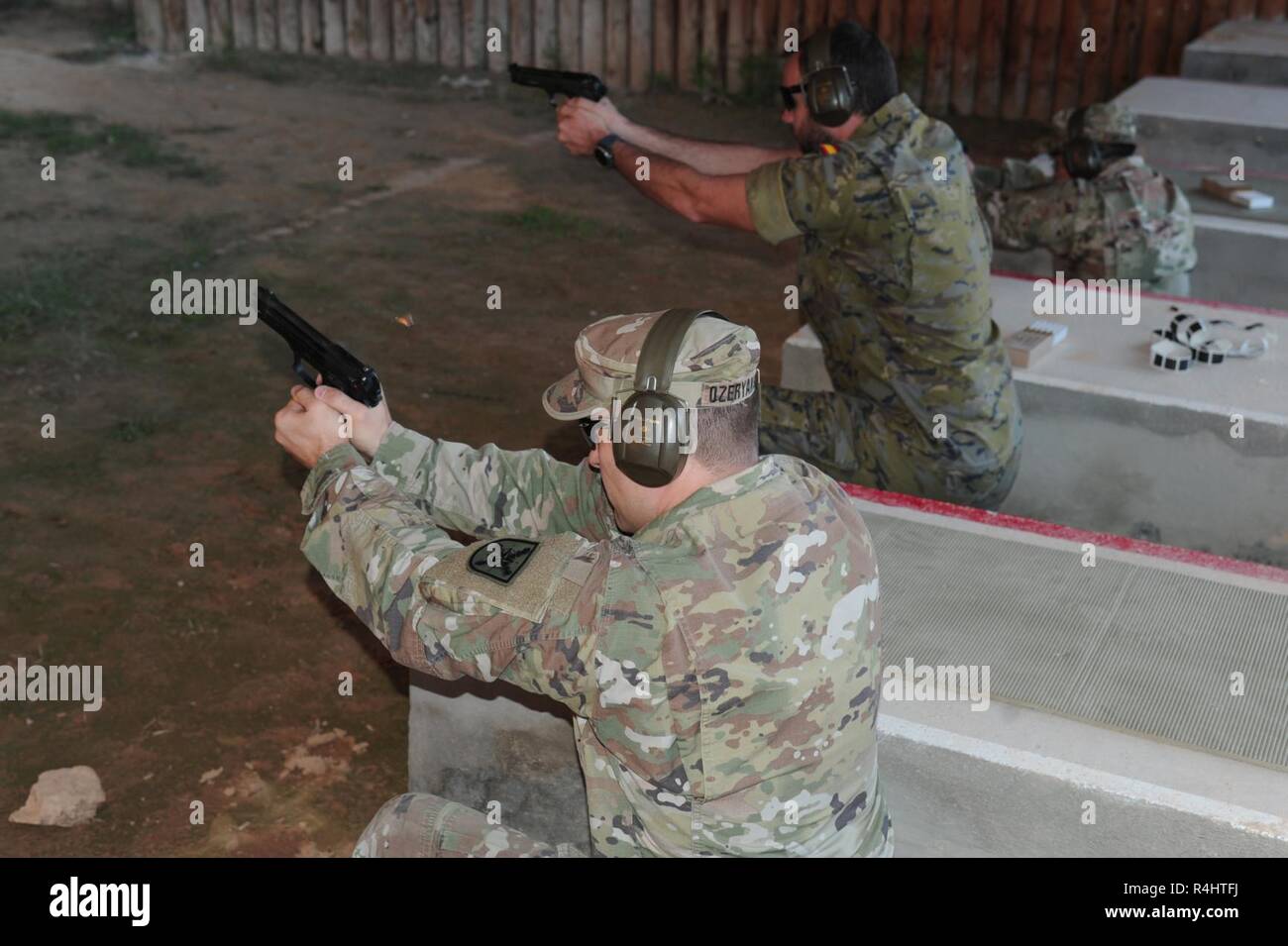 US Army Soldier from NRDC Spain and a Spanish Soldier from NRDC Spain ...