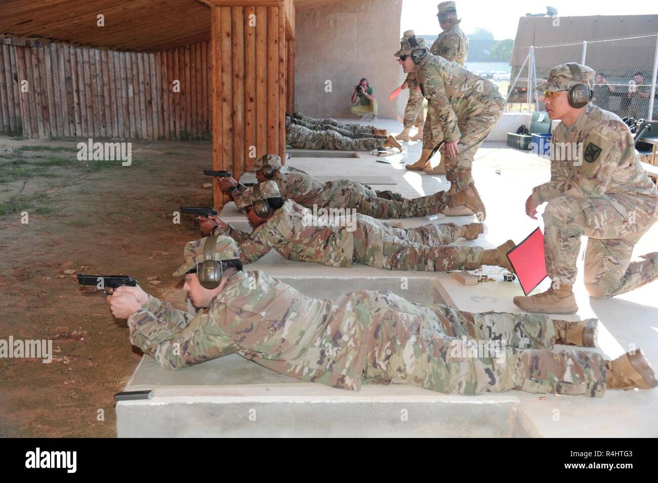 US Army Soldiers from NRDC Spain fire an M9 9mm pistol during ...